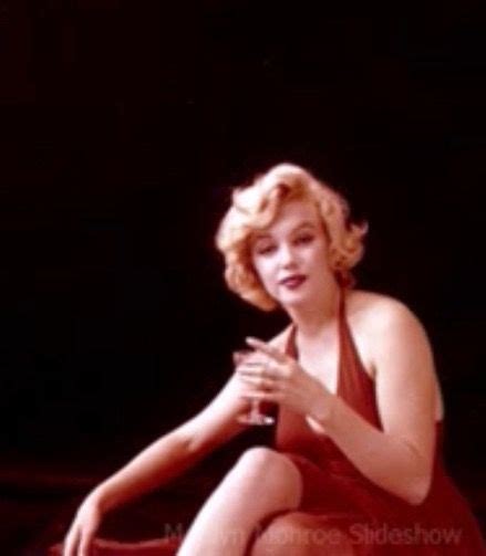 Red Dress Sitting By Milton Greene1957 Marilyn Monroe Photos Milton