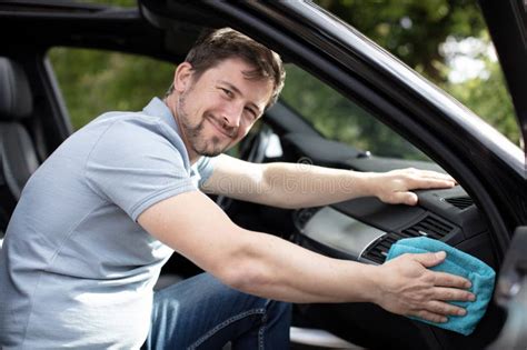 Young Man Polishing Car With Microfiber Cloth Stock Image Image Of