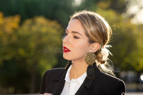 Portrait Of A Stunningly Beautiful Young Model Posing In The Street In
