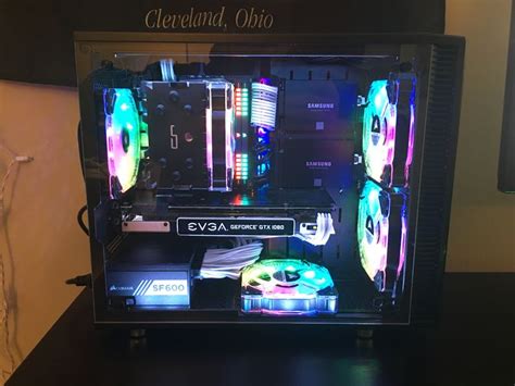 A Computer Case With Several Different Colored Lights On It