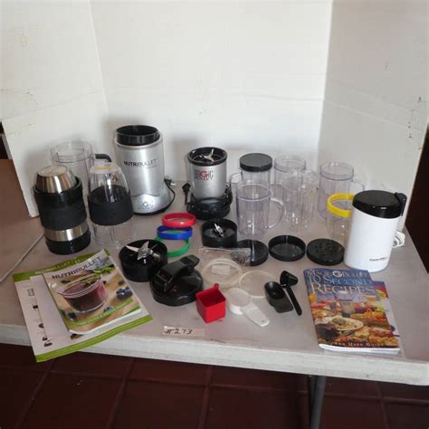 Lot 273 Nutri Bullet And Magic Bullet W Extra Cups Recipe Books