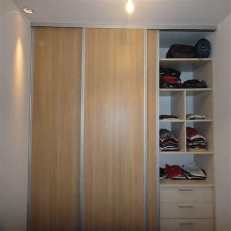 Detalle Placard Gr Arquitectura Vestidores Y Placares Modernos Madera Multicolor Homify