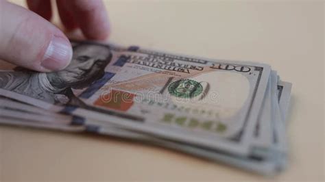 Close Up Of Male Hands Counting A Stack Of Hundred Dollar Stock Video