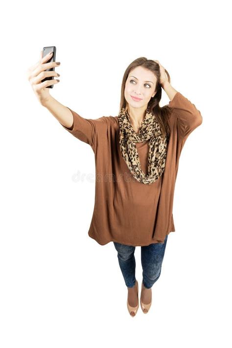 Young Gorgeous Woman Taking Self Portrait Or Selfie With Smartphone