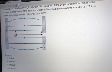 Solved A Particle Is Traveling Through Between The Capacitor