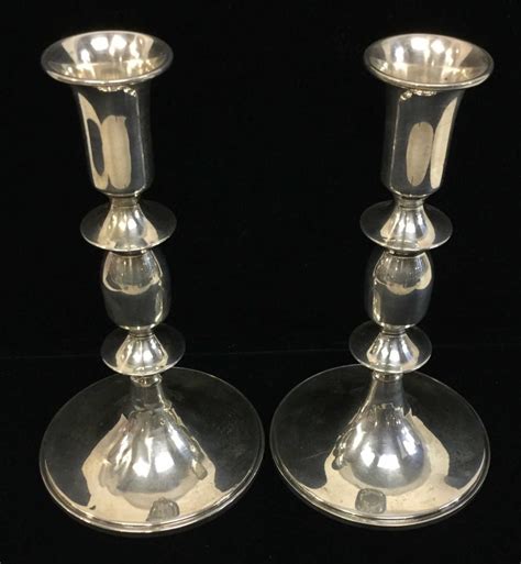 lot 2 pairs weighted sterling candlestick holders