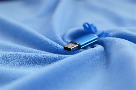 Premium Photo Brilliant Blue Usb Flash Memory Card With A Blue Bow