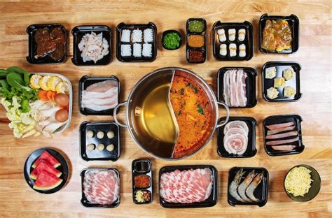 Premium Photo Set Of Shabu Shabu In Hot Pot Fresh Sliced Meat Sea