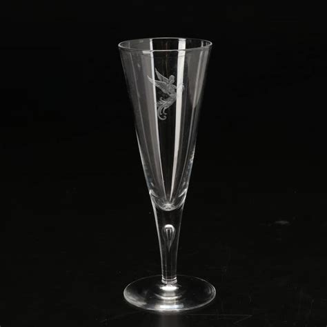 Steuben Flutes With Etched Winged Figure Design And Suspended Bubble