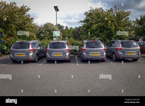 4 Matching Renault Scenic Cars Parked Together At Durham A1 Motorway