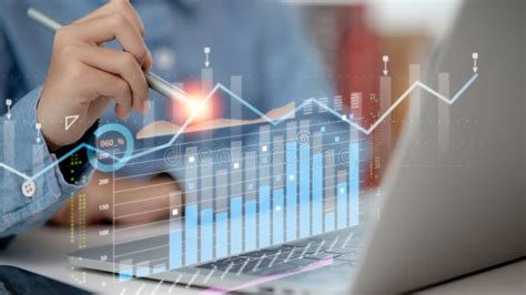 Businessman Drawing Virtual Technical Graphs And Charts For Analysis Of