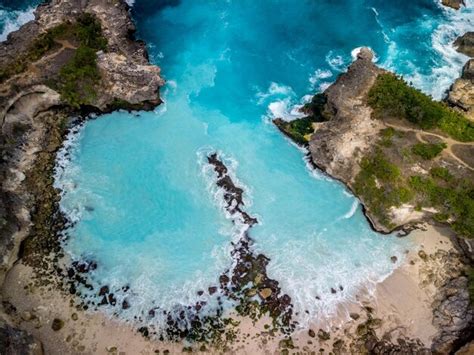 Premium Photo High Angle View Of Rocks On Beach