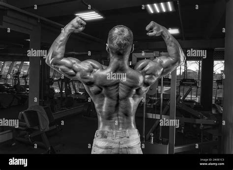 Professional Athlete Posing In The Gym Back View Bodybuilding And