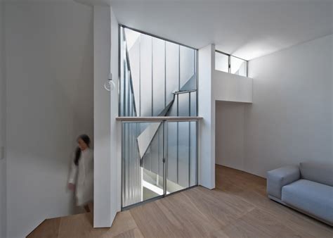 house by alphaville has three blocks connected by bridges