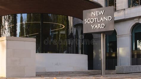 New Scotland Yard Revolving Sign At The Entrance Of The London