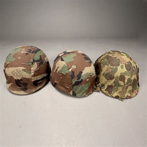 Lot 260 Three Us Military Helmets With Camouflage Covering