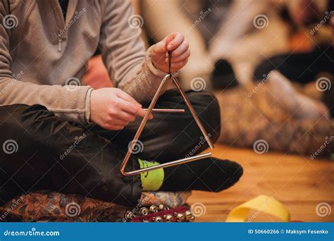 Girl Playing A Musical Triangle Stock Photo Image Of Percussion Person