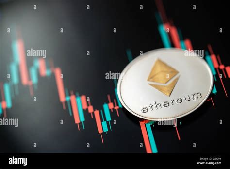 silver ethereum cryptocurrency with candle stick graph chart and