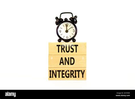 Trust And Integrity Symbol Concept Words Trust And Integrity On Wooden