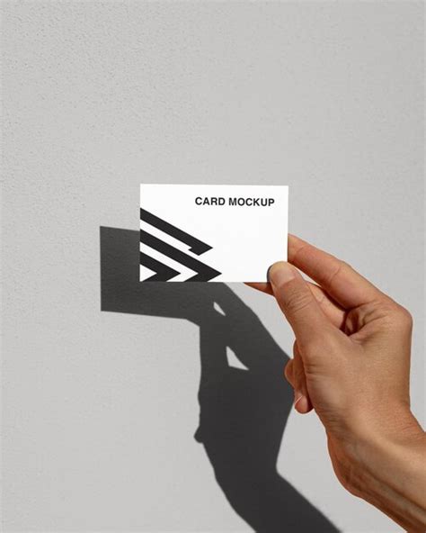 Premium Psd A Hand Holding A Card Mockup