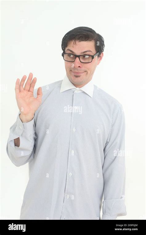 Shy And Insecure Male Nerd Wearing Glasses On White Background Stock
