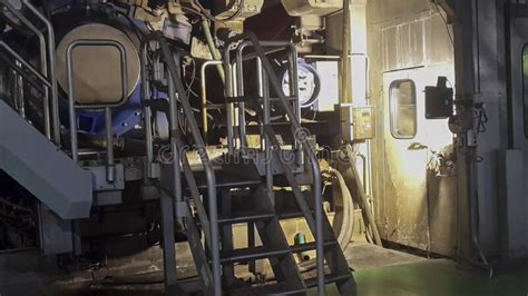 Machineries In A Plant White Paper Reels Are Being Manufactured In A Paper Editorial Stock