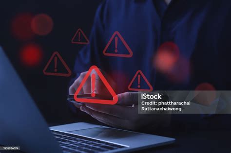 Businessman Or Employee With Triangle Warning Sign For Error Warning