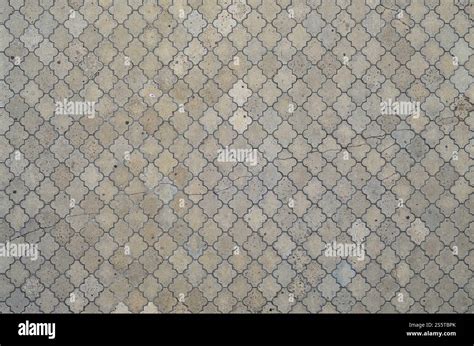 The Texture Of A Rhythmic Mosaic Made Of Concrete Tiles Background Image Of A Large Area Of Old