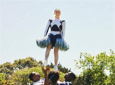 Premium Photo Fitness Portrait And Woman Cheerleader On A Field For Motivation Or Support