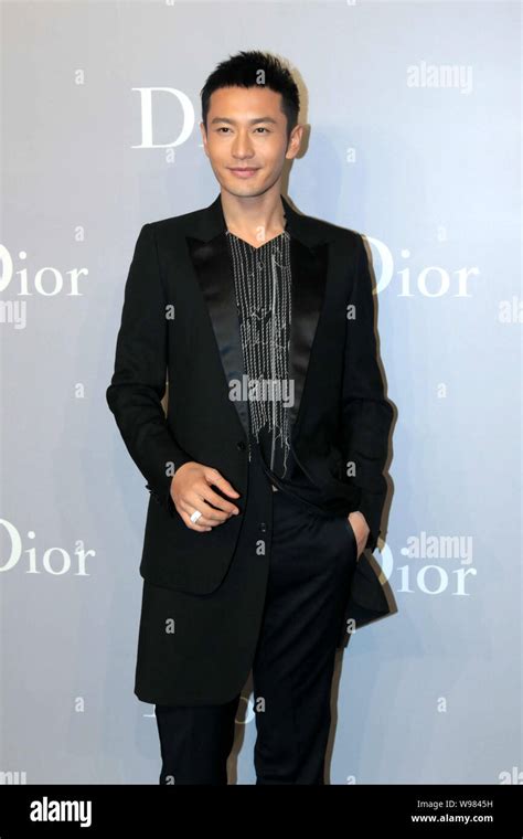 Chinese Singer And Actor Huang Xiaoming Poses At The Opening Ceremony