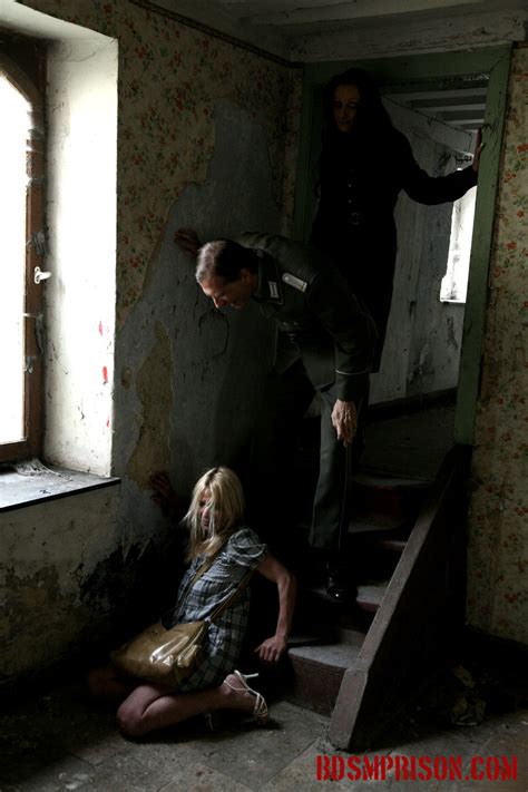 Young Blonde Girl Has Her Tits Exposed By Her Jailers Inside Prison