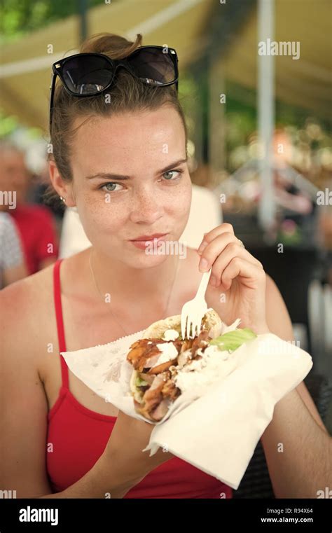 Pretty Girl Or Woman Eating Sandwich Gyros Girl With Pleasure Eats