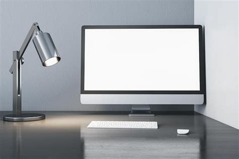 빈 흰색 모의 컴퓨터 모니터 램프 및 키보드 3d 렌더링이 있는 창의적인 디자이너 나무 책상 프리미엄 사진