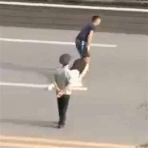 Horrifying Video Shows Woman Dragged By Hair Across Road But Is It A
