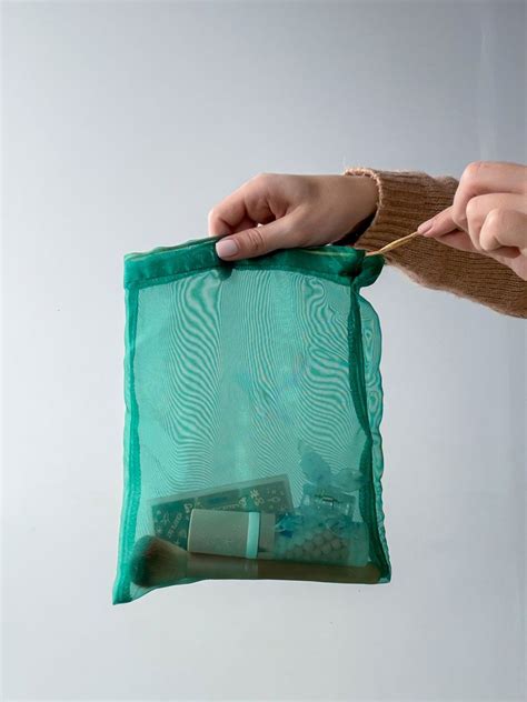 Прозорий сітчастий мішечок на завязках багаторазовий пакувальний мішечок для косметики