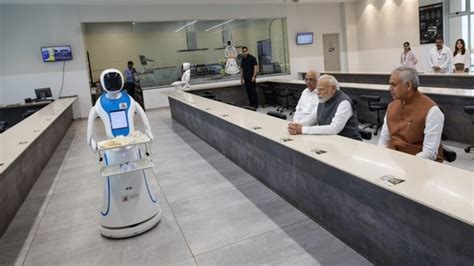 Pm Modi Enjoys Tea Served By Robots At Robotics Gallery In Gujarat See Pics Hindustan Times