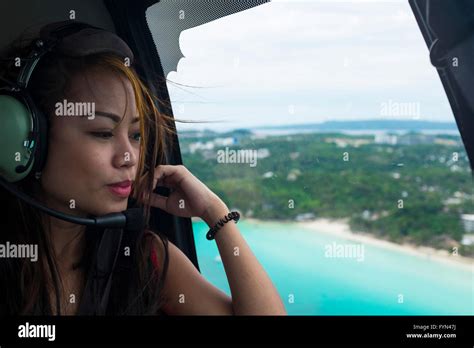 Beautiful Asian Girl In A Helicopter Over Boracay Philippines Stock