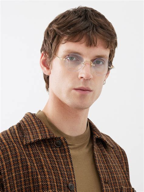 Matsuda Rimless Round Titanium Glasses Gold Editorialist