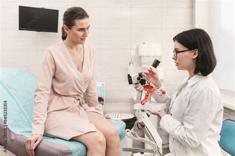 Medical Examination In A Gynecologist S Chair The Doctor Shows And Explains The Genital Organs