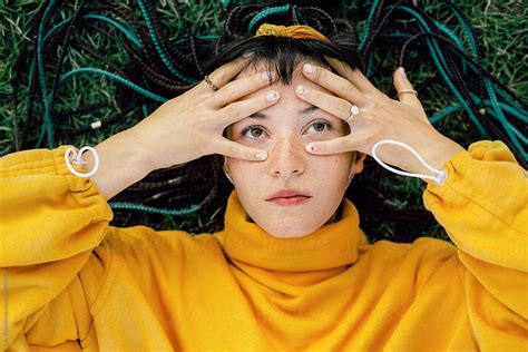 Portrait Of A Woman With Her Hands On Her Face By Stocksy Contributor