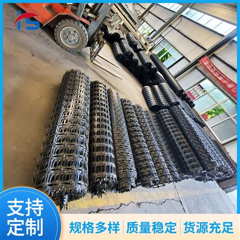 山东路基加固材料 Kn双向拉伸塑料土工格栅 批发双向塑料土工格栅 阿里巴巴