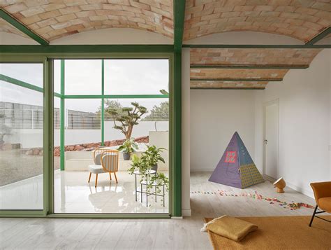 Space Populars Brick Vault House Slots Into Slender Green Grid