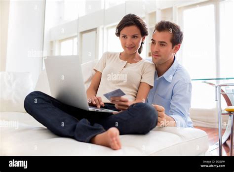Woman Man Laptop Indoor Living Room Computer Internet Sofa Stock Photo Alamy