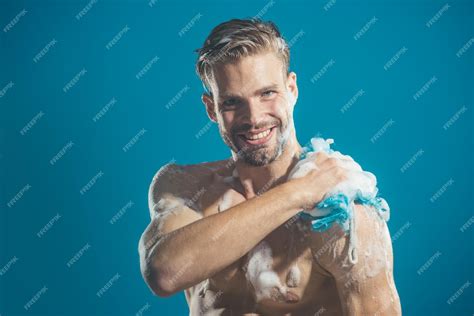 Premium Photo Man With Naked Torso Is Washed In Shower Muscular Guy