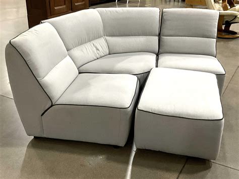 Lot 4pc Modern Style Modular Sectional And Ottoman