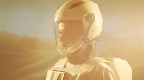 A Woman Astronaut In A Spacesuit Explores Another Planet Young Female