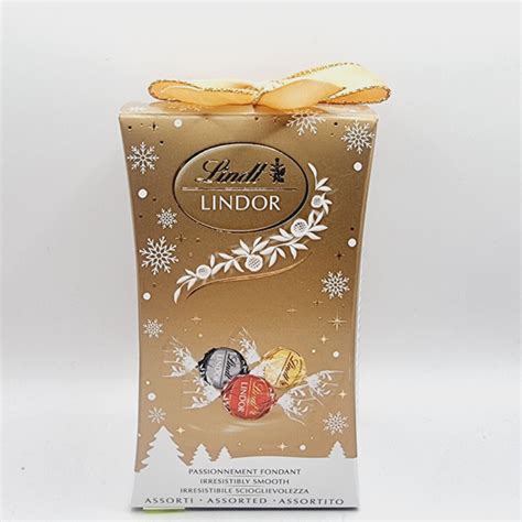 Конфеты Lindt Lindor ASSORTED ассорти шоколад в подарочной коробке 75 г ...