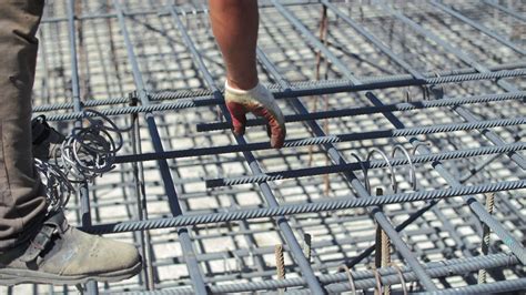 Connecting Reinforcement With Wire At A Construction Site Stock Video At Vecteezy