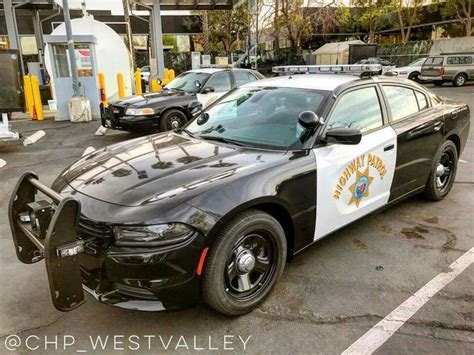 A Police Car Is Parked In The Parking Lot