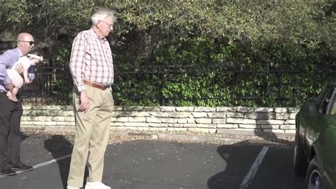 Dad Is Admiring A Car He Sees Parked In A Restaurant Parking Lot It